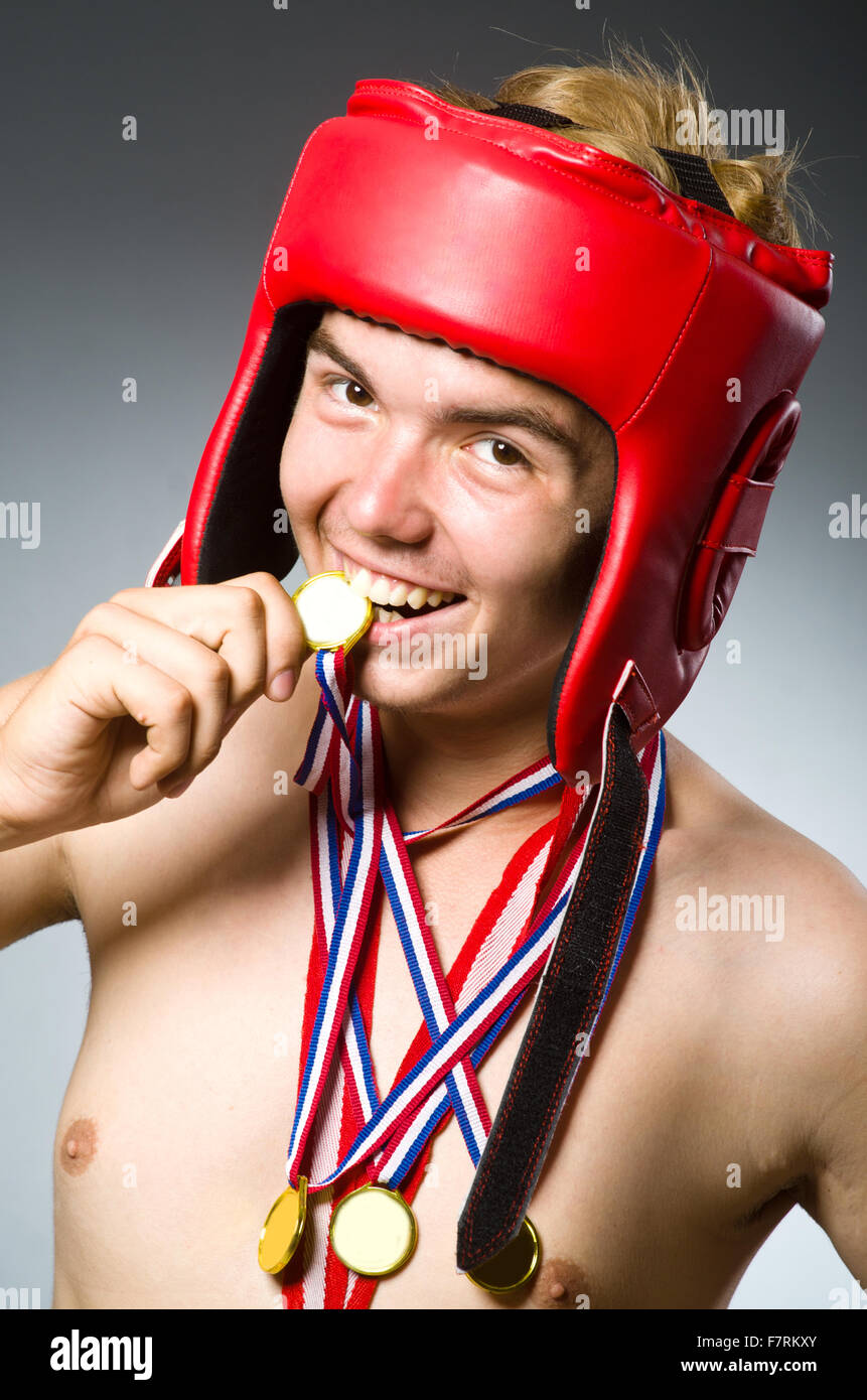 Funny boxer with winning gold medal Stock Photo - Alamy