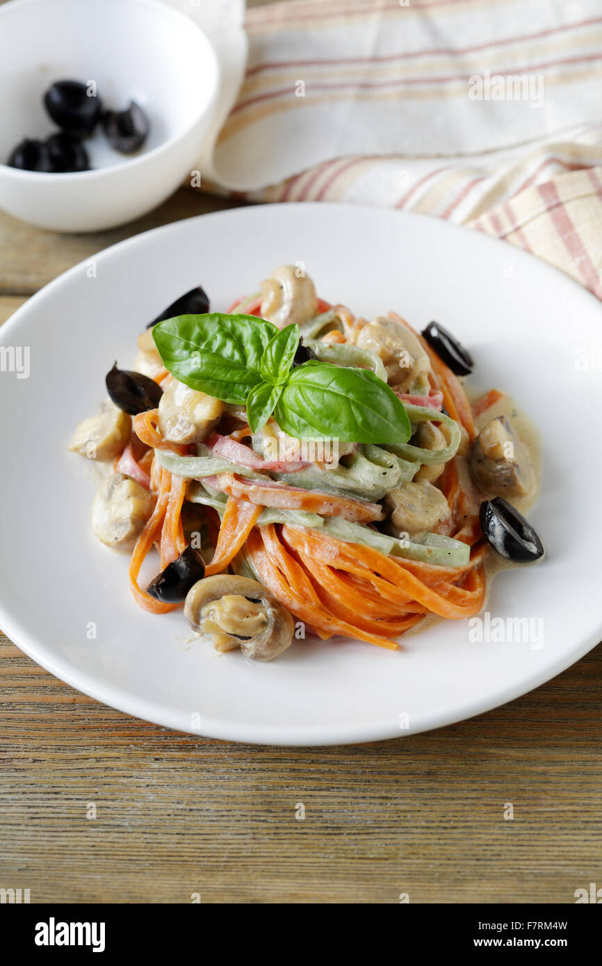 color pasta with mushrooms and olive, food closeup Stock Photo - Alamy