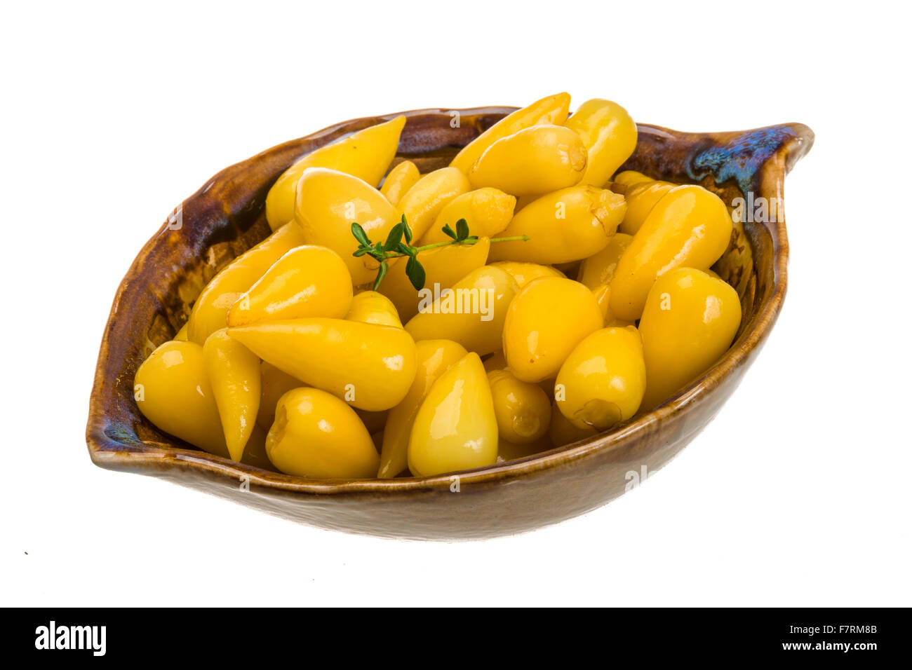Yellow marinated hot pepper isolated Stock Photo - Alamy