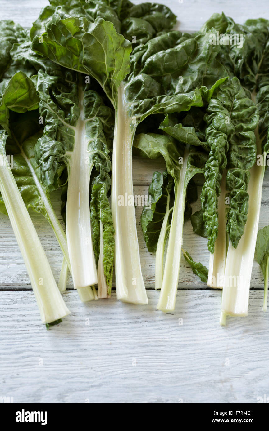 fresh swiss chard on white boards, vegetables Stock Photo - Alamy