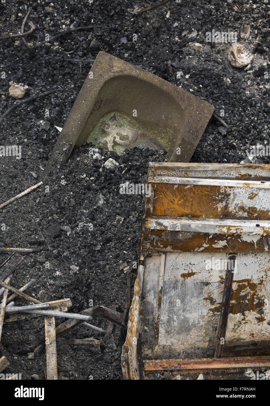 Burnt debris in the basement two days after the devastating fire at ...
