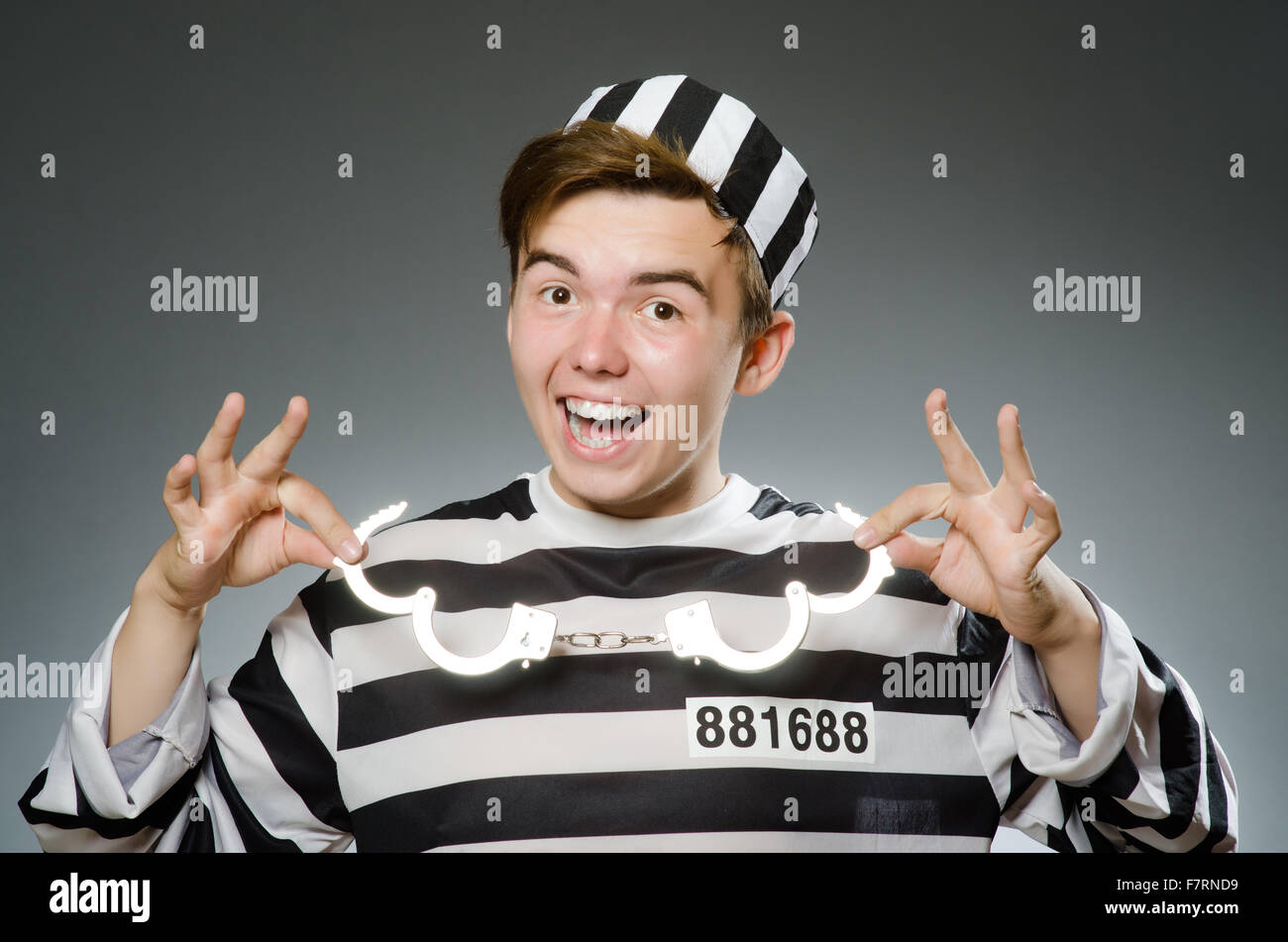 Prison inmate in funny concept Stock Photo - Alamy