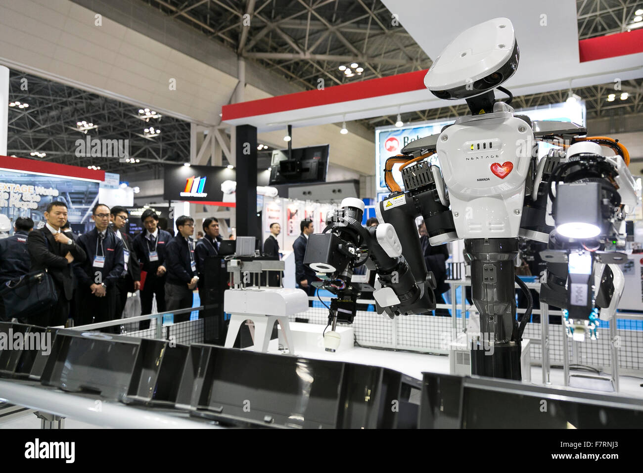 The Next-generation industrial robot NEXTAGE performs at the ...