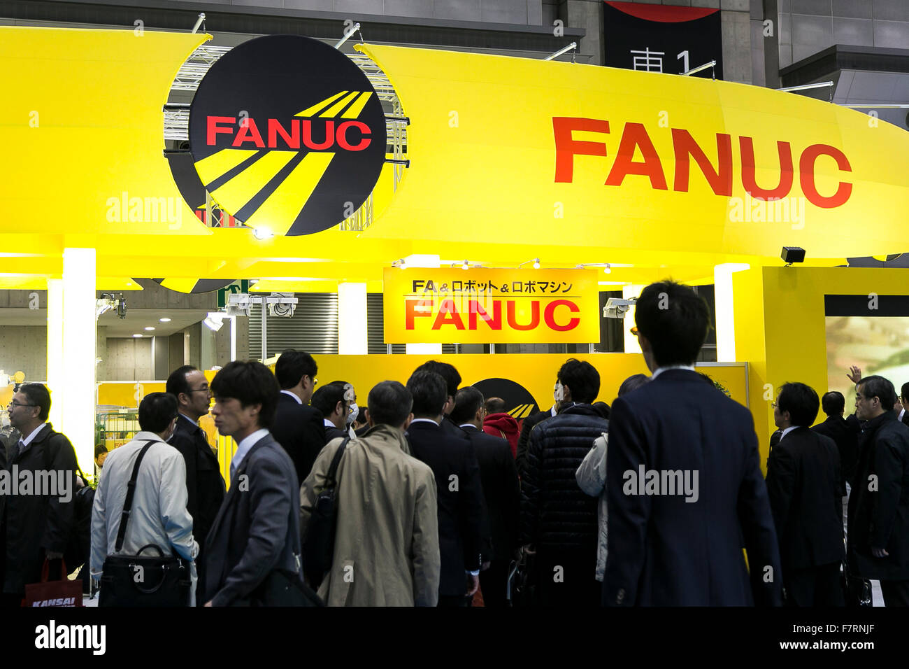 Visitors gather at the International Robot Exhibition 2015 on December ...