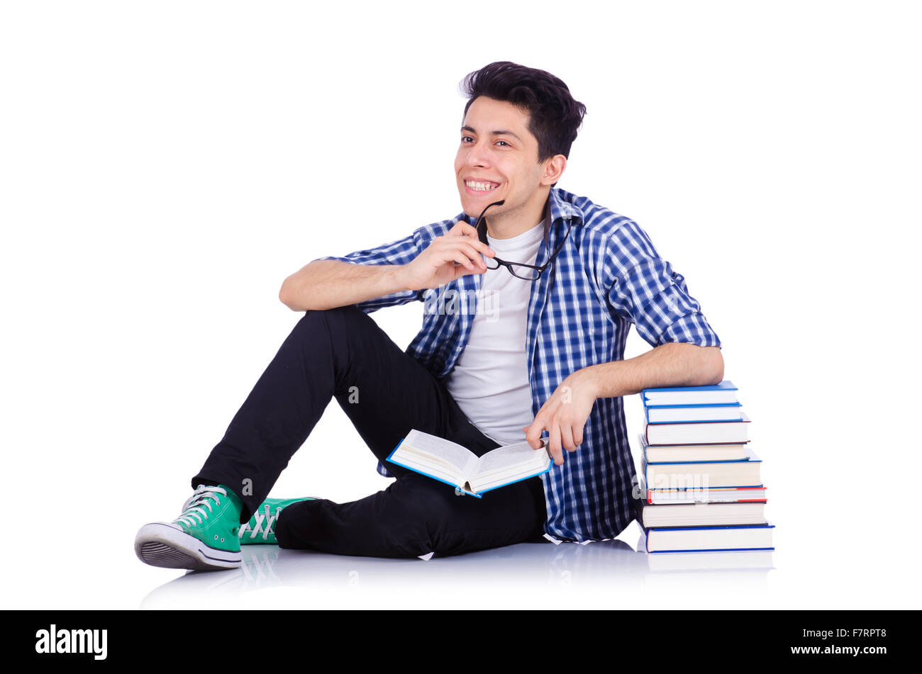 Student with lots of books on white Stock Photo - Alamy