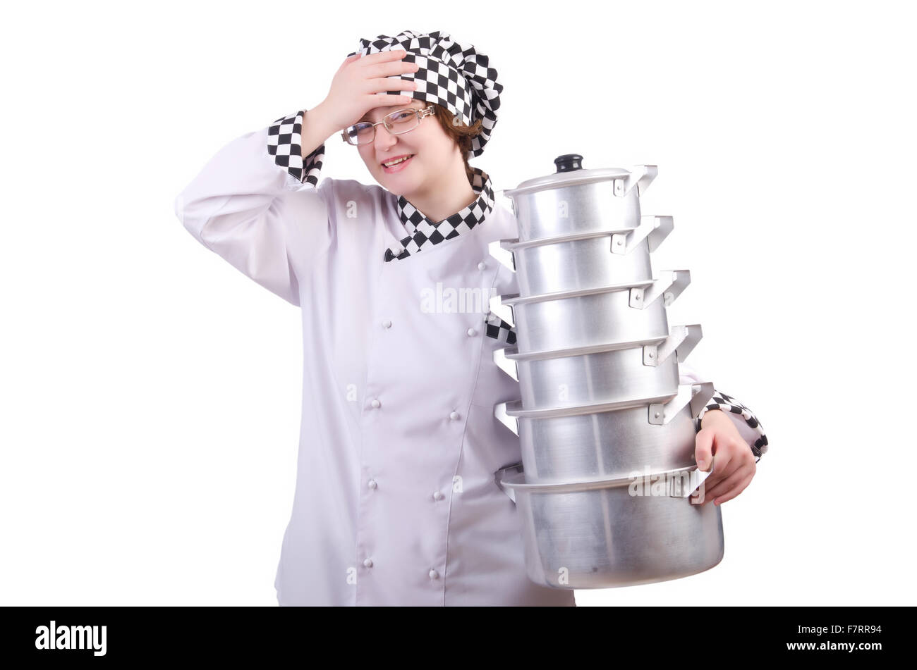 Cook with stack of pots on white Stock Photo - Alamy