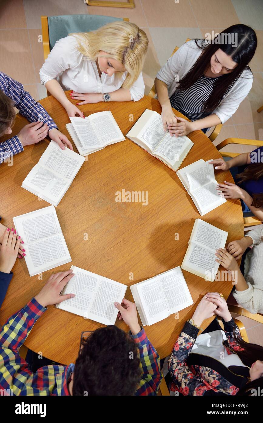 happy young teens group in school have fun an learning lessons Stock ...