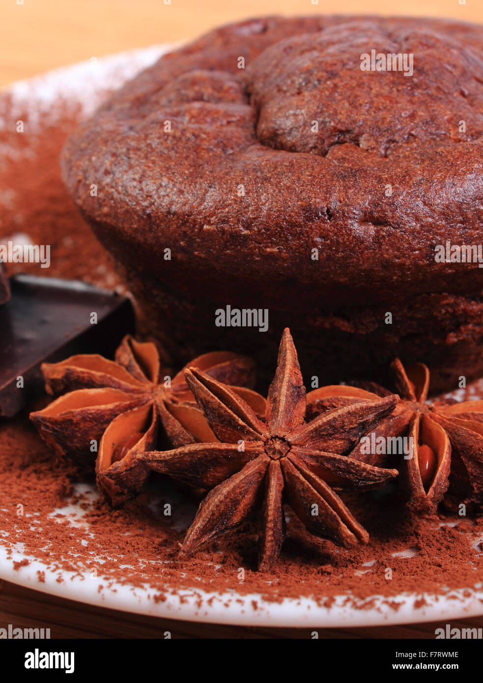 Homemade delicious fresh baked chocolate muffins with cocoa, star anise ...