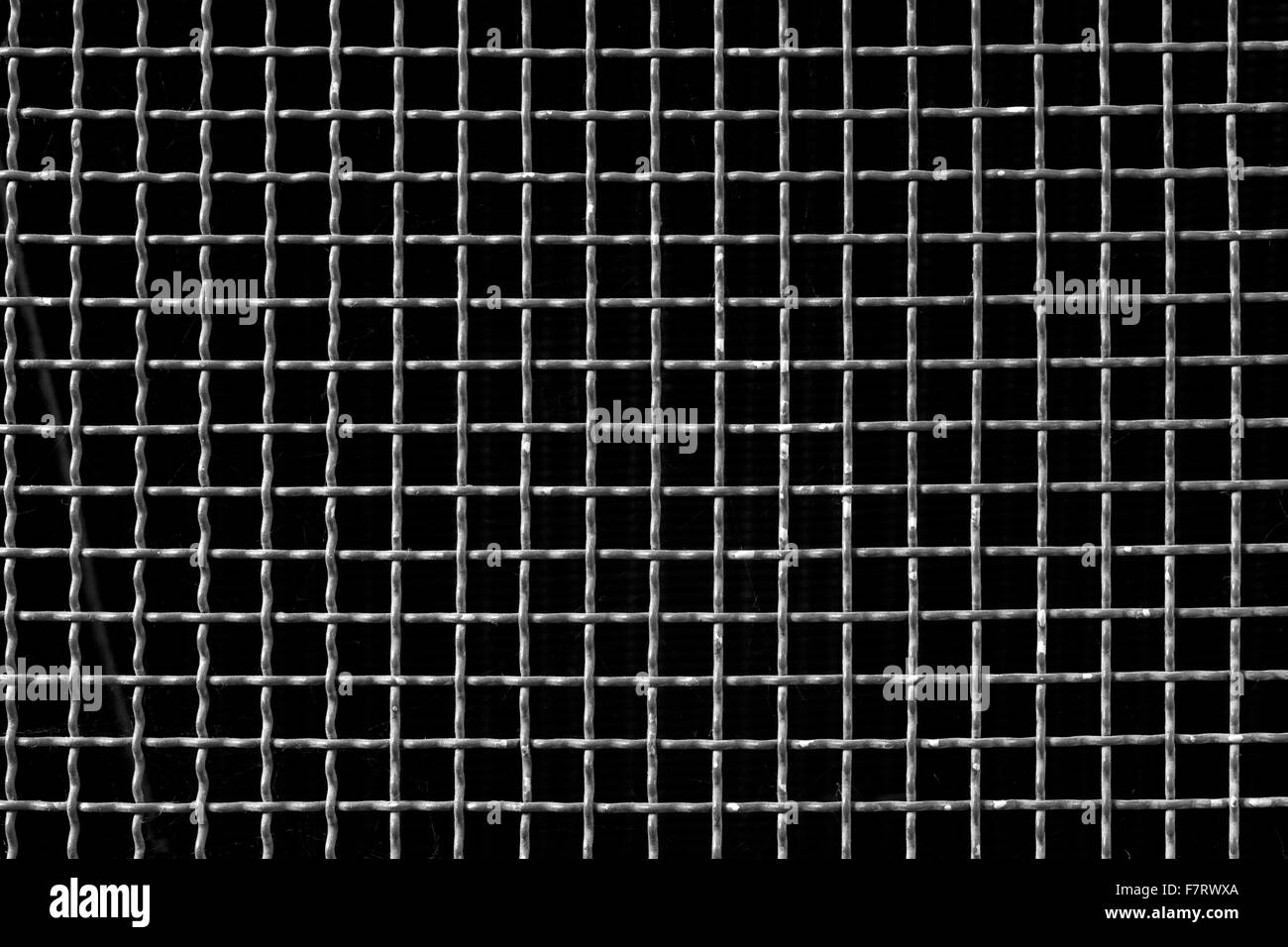 grey metal grid on black background or grille pattren texture Stock ...