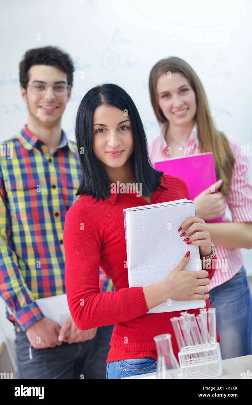 happy young teens group in school have fun an learning lessons Stock ...