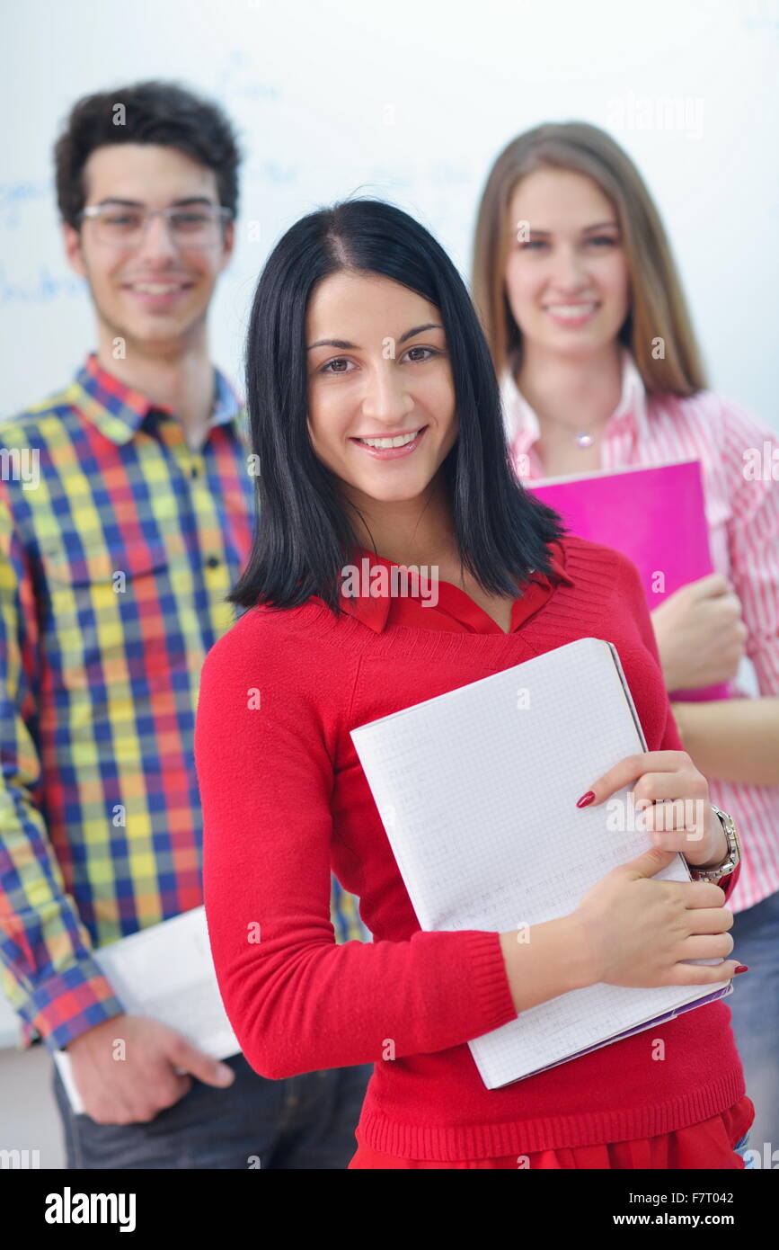 happy young teens group in school have fun an learning lessons Stock ...