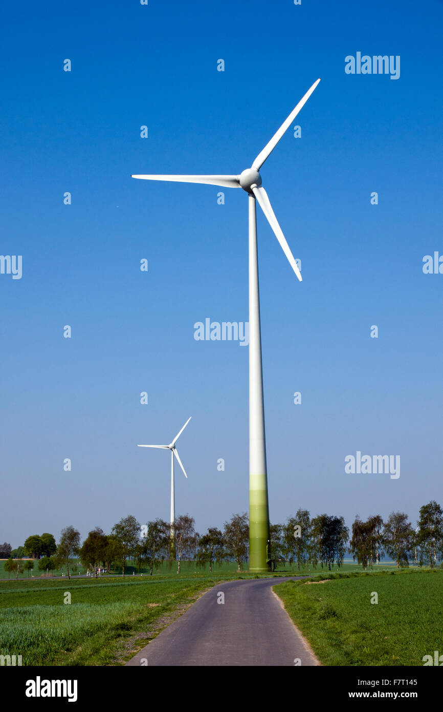 Two windwheels in the fields Stock Photo - Alamy