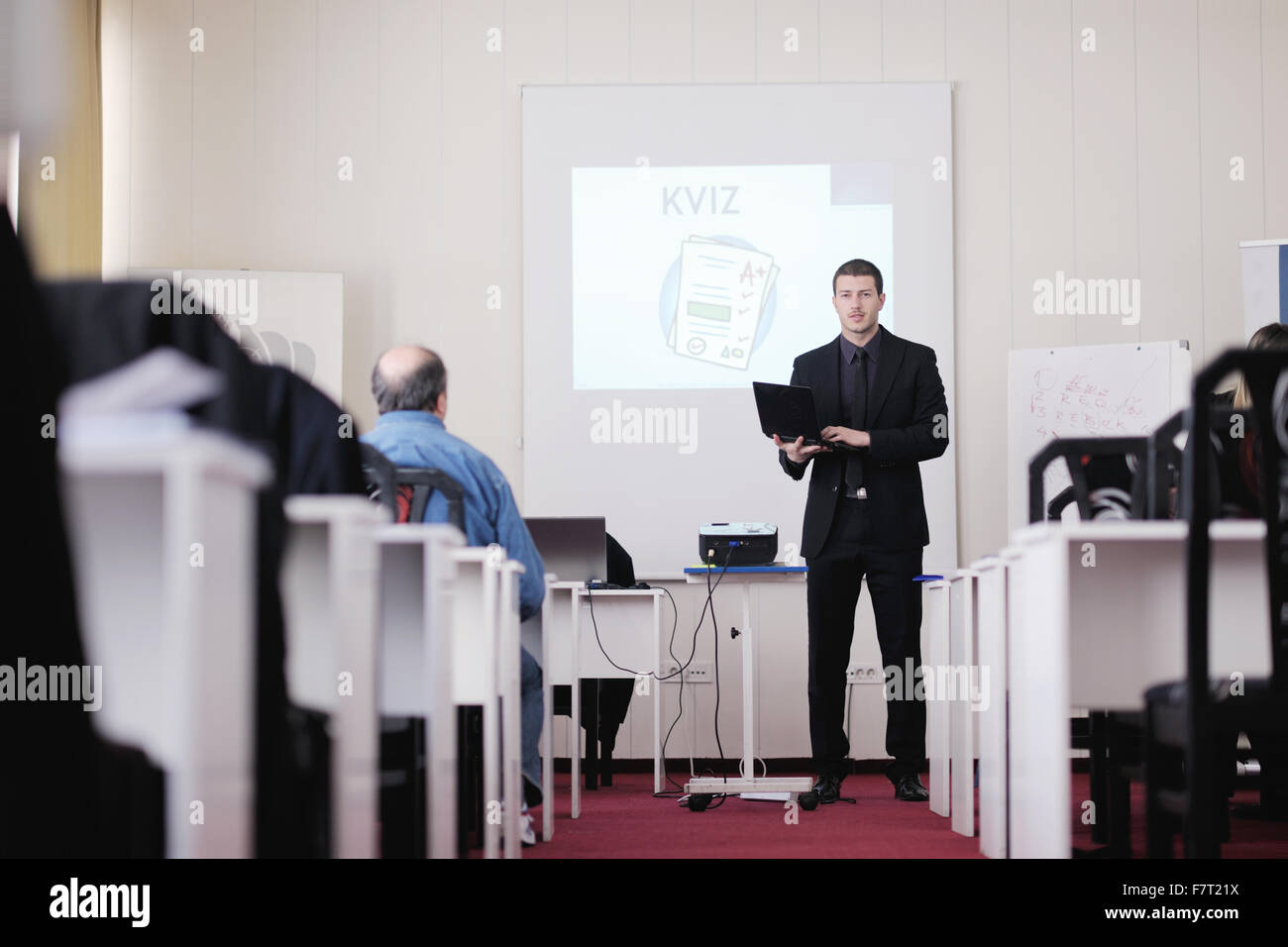 young business man giving presentation and education leassons on ...