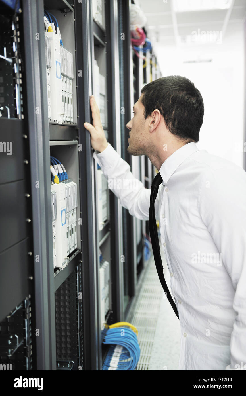 young handsome business man it engeneer in datacenter server room Stock ...