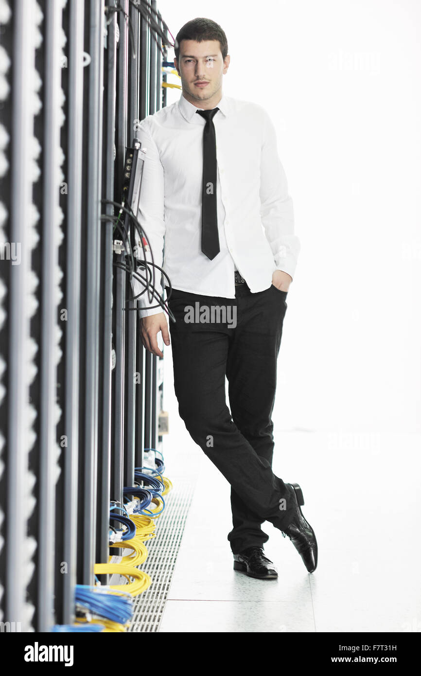 young handsome business man it engeneer in datacenter server room Stock ...