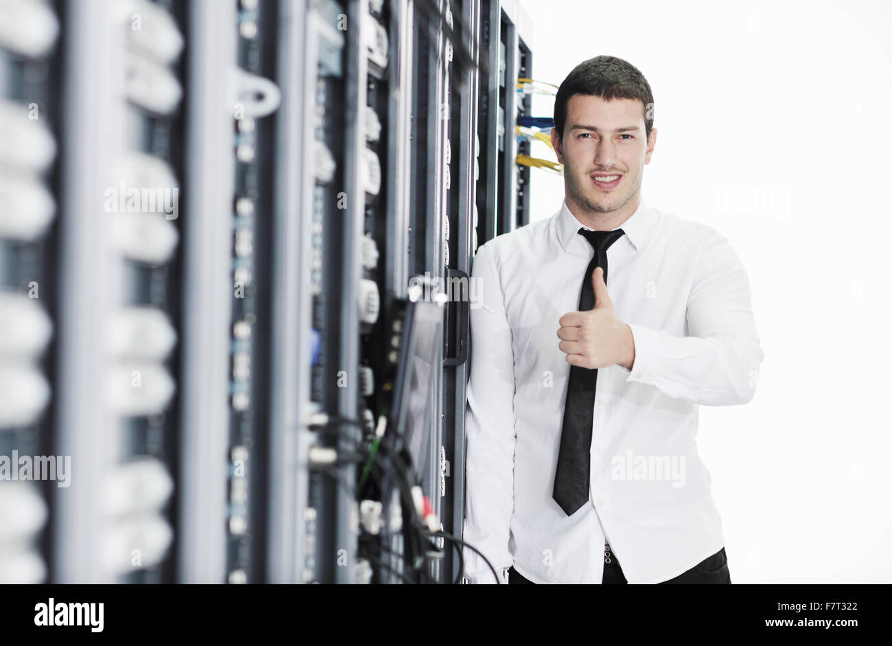 young handsome business man it engeneer in datacenter server room Stock ...