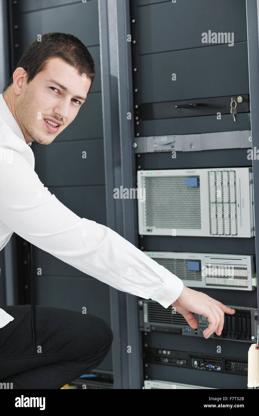 young handsome business man it engeneer in datacenter server room Stock ...