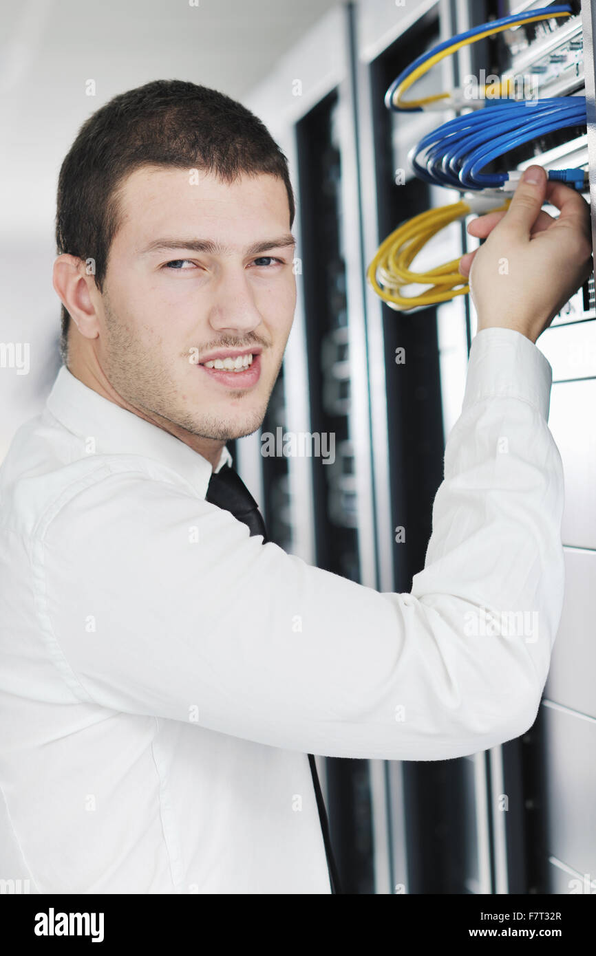 young handsome business man it engeneer in datacenter server room Stock ...