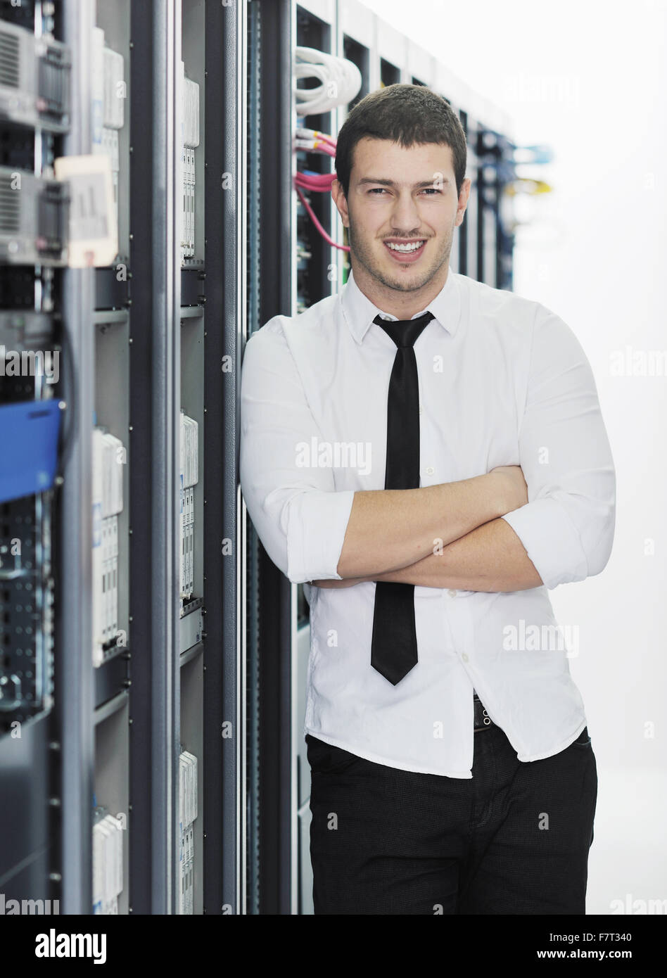 young handsome business man it engeneer in datacenter server room Stock ...