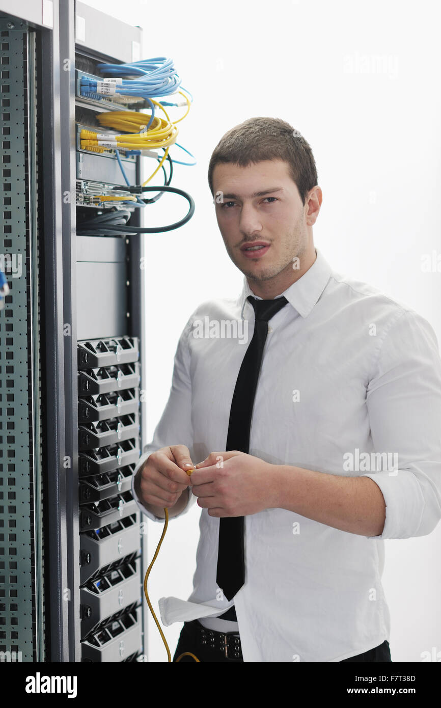 young handsome business man it engeneer in datacenter server room Stock ...