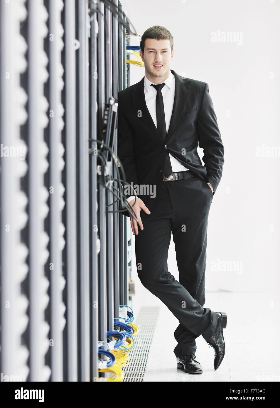 young handsome business man it engeneer in datacenter server room Stock ...