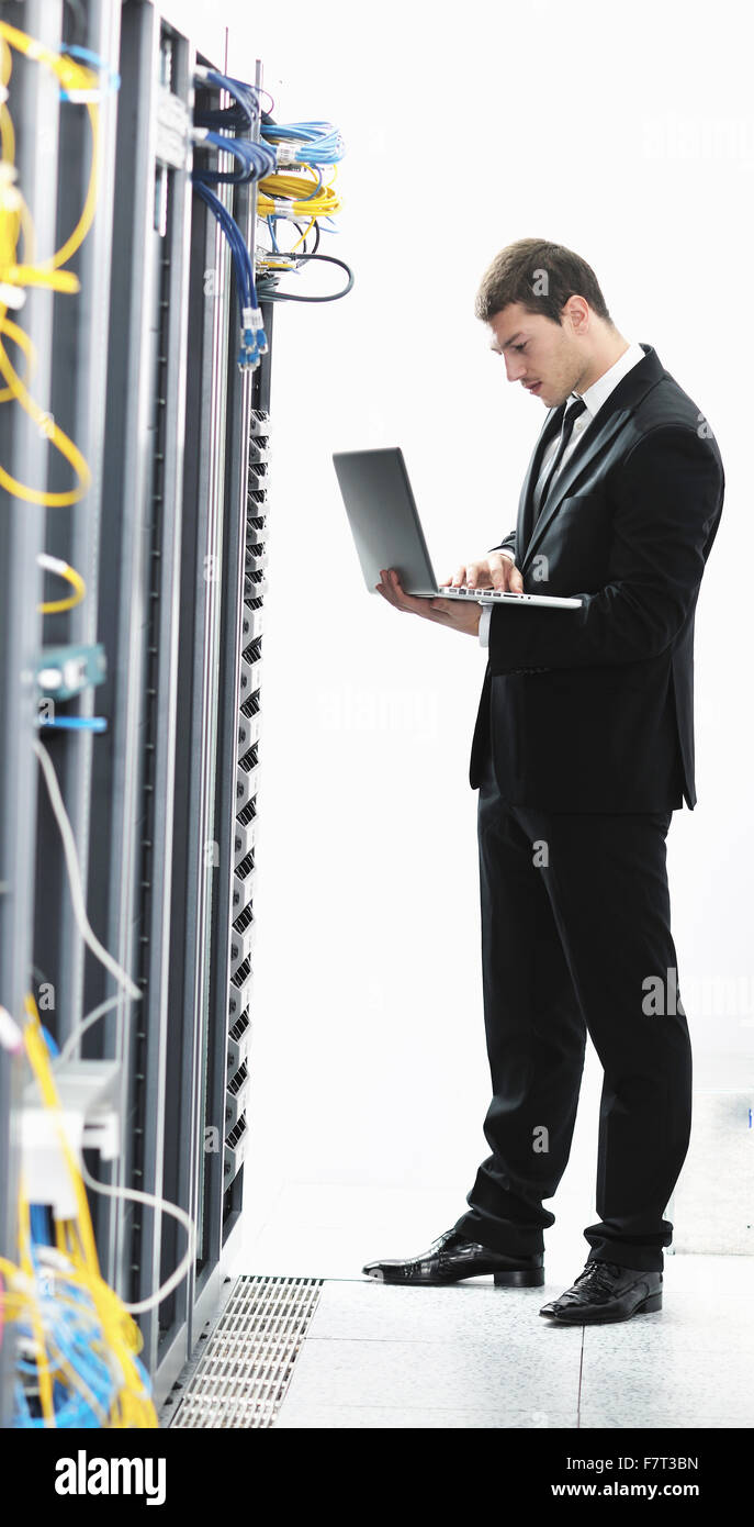 young it engeneer business man with thin modern aluminium laptop in ...