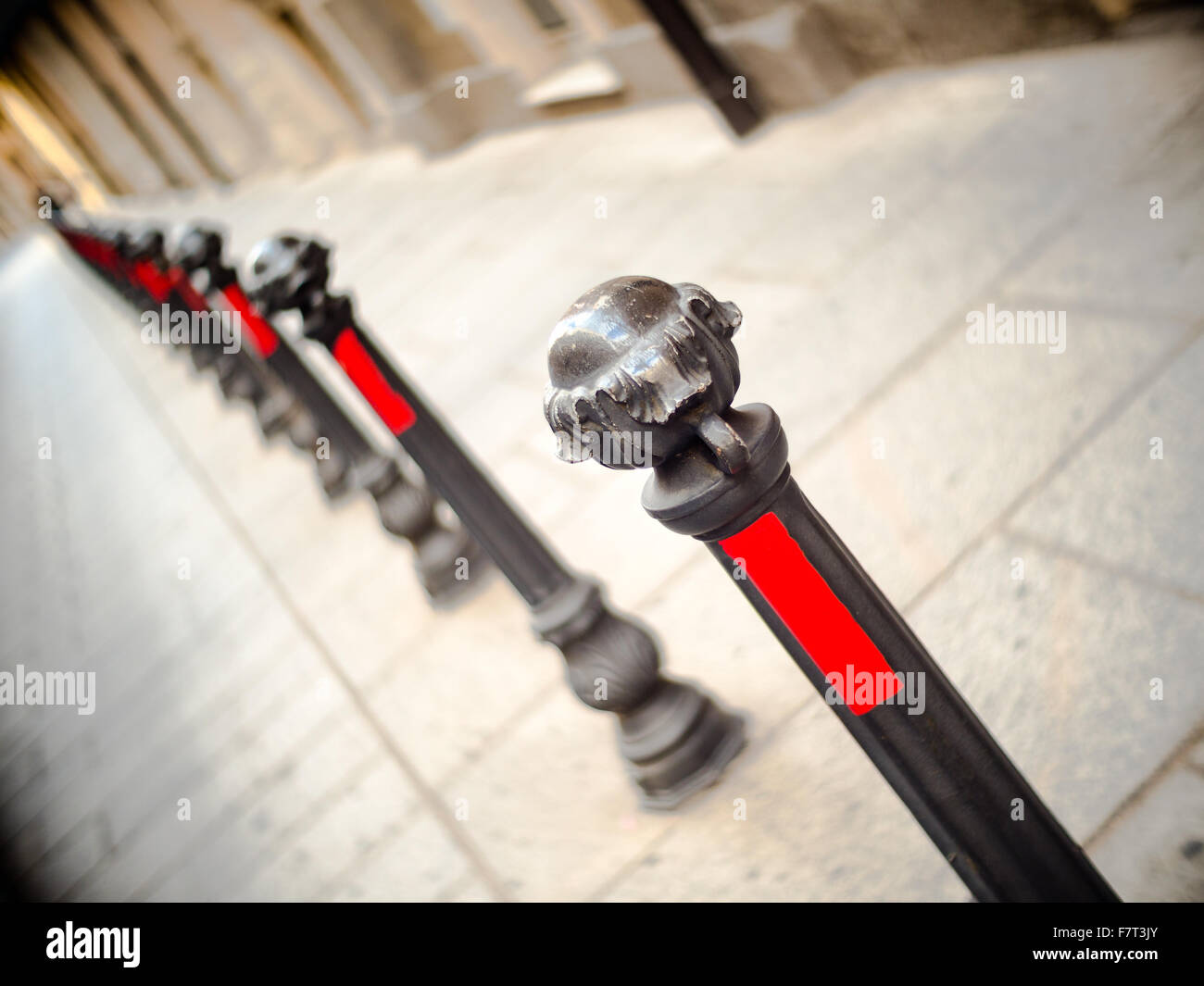 stakes delimiters pedestrian zone. Line stake with red reflector on the ...