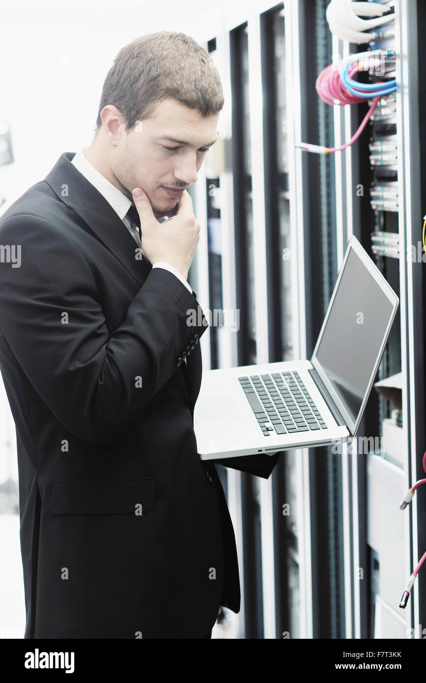 young it engeneer business man with thin modern aluminium laptop in ...