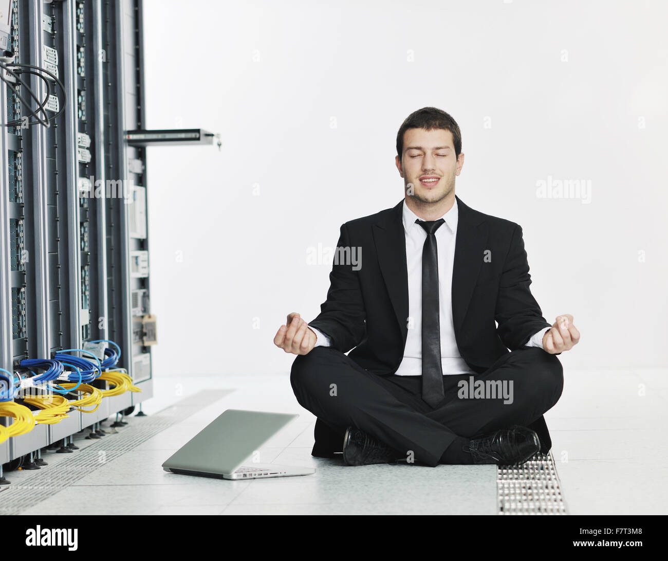 young it engeneer business man with thin modern aluminium laptop in ...