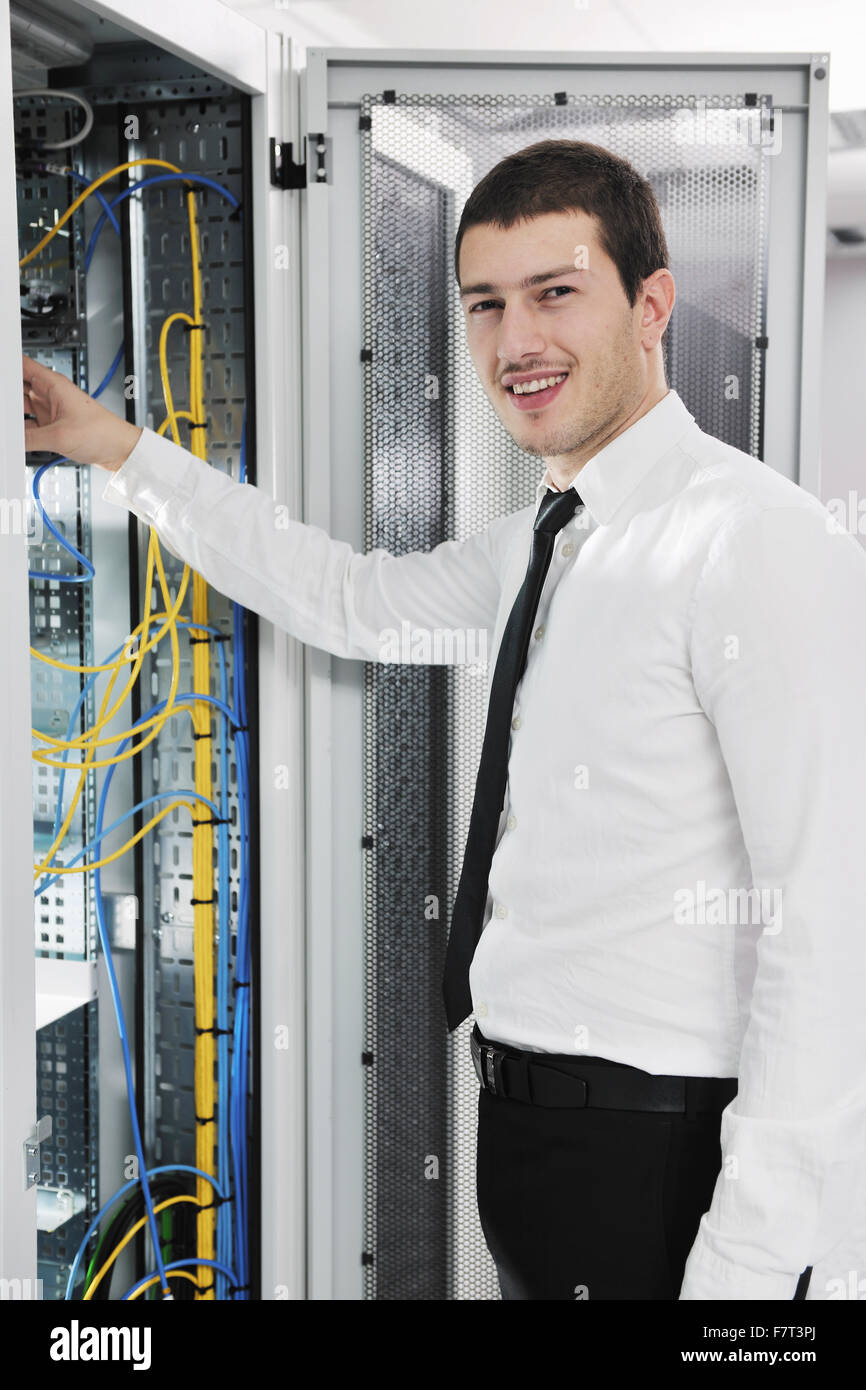young handsome business man it engeneer in datacenter server room Stock ...