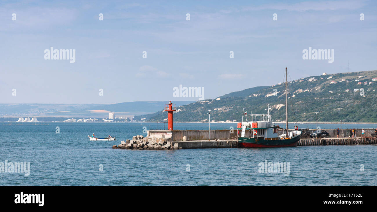 Balchik, Bulgaria - July 18, 2014: Entrance pier in port of Balchik ...