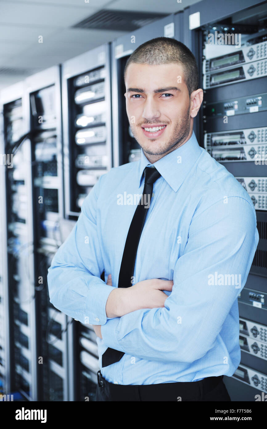 young handsome business man engineer in datacenter server room Stock ...