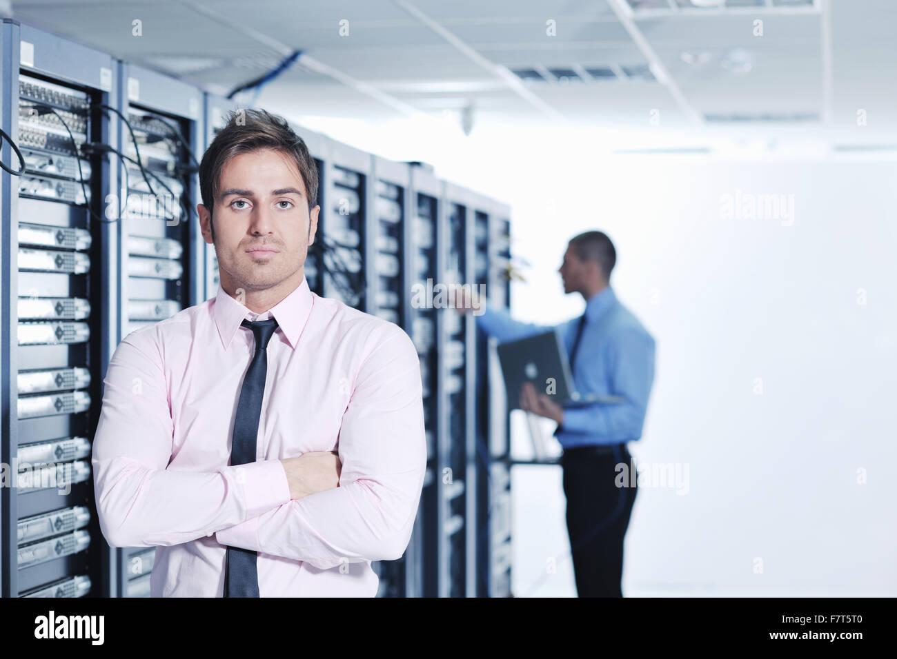 group of young business people it engineer in network server room ...