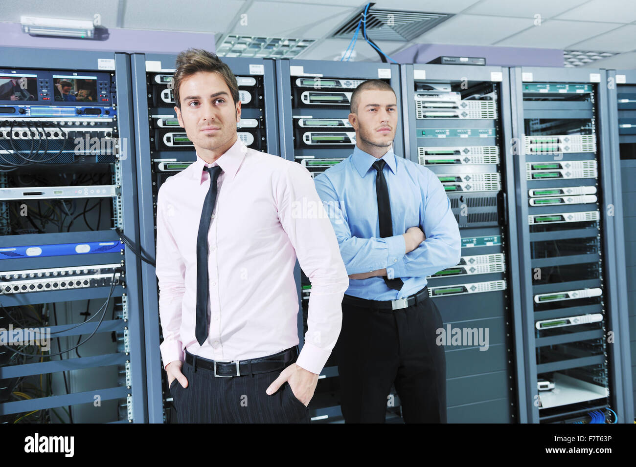 group of young business people it engineer in network server room ...
