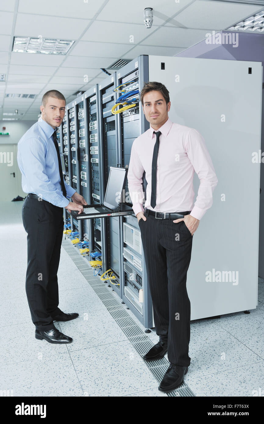group of young business people it engineer in network server room ...