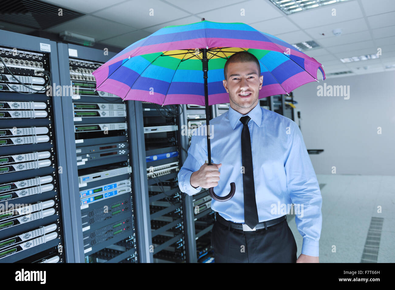 young handsome business man engineer in businessman hold rainbow ...