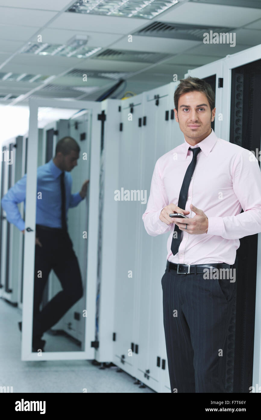 young business man computer science engeneer talking by cellphone at ...