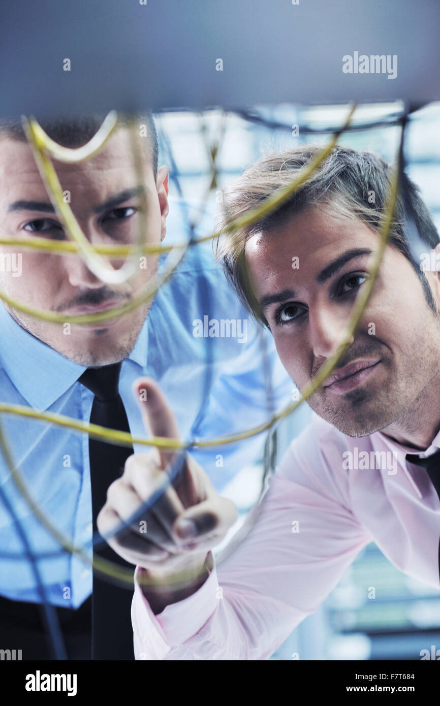 group of young business people it engineer in network server room ...