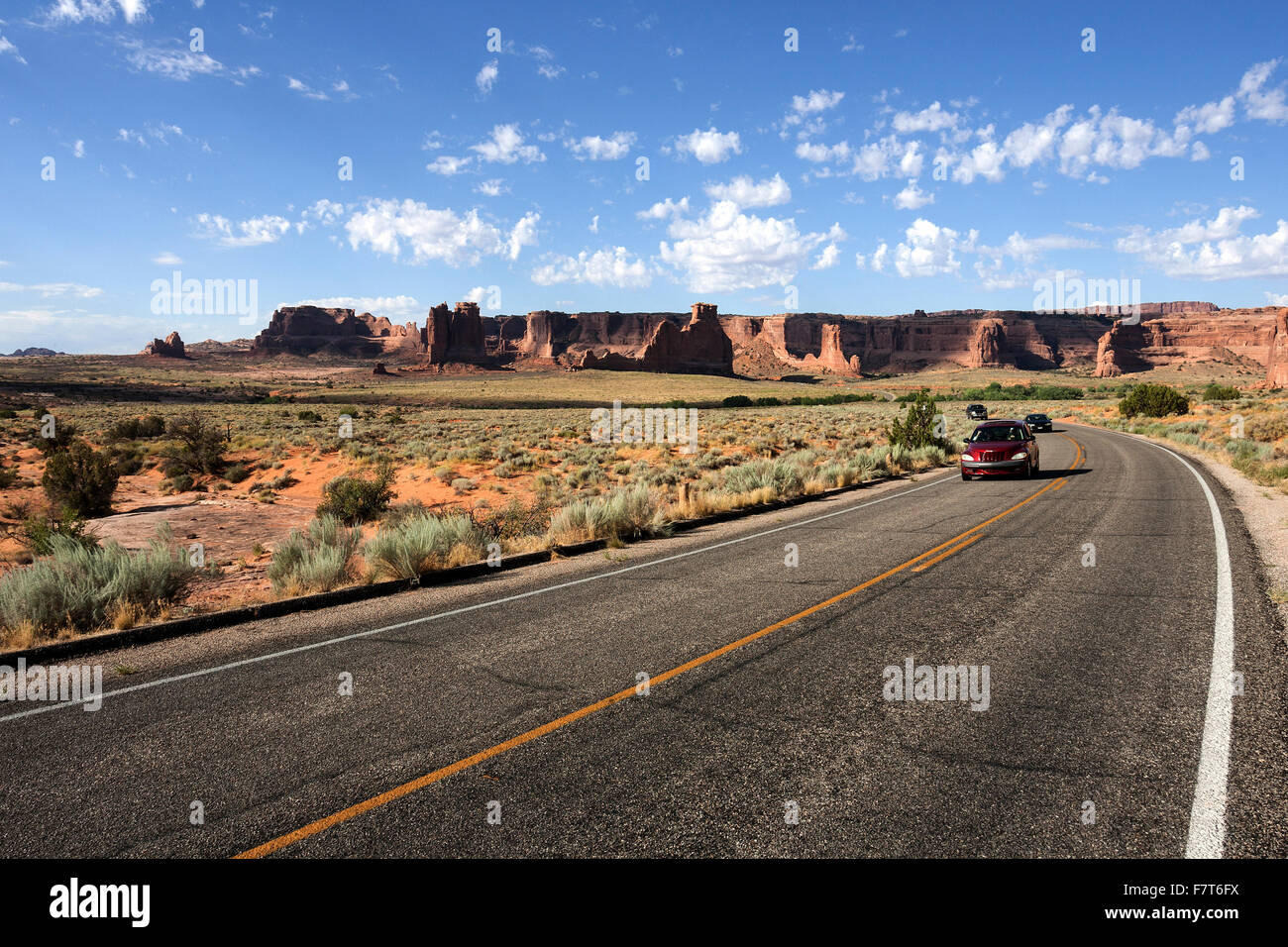 Road with cars, Arches Science Drive, Courthouse Towers behind, Arches ...