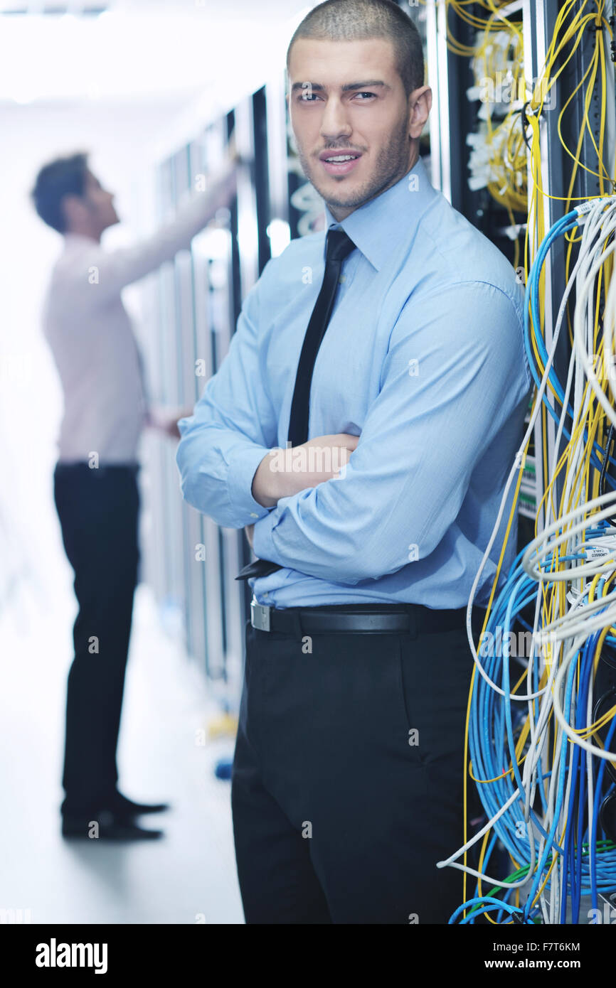 group of young business people it engineer in network server room ...