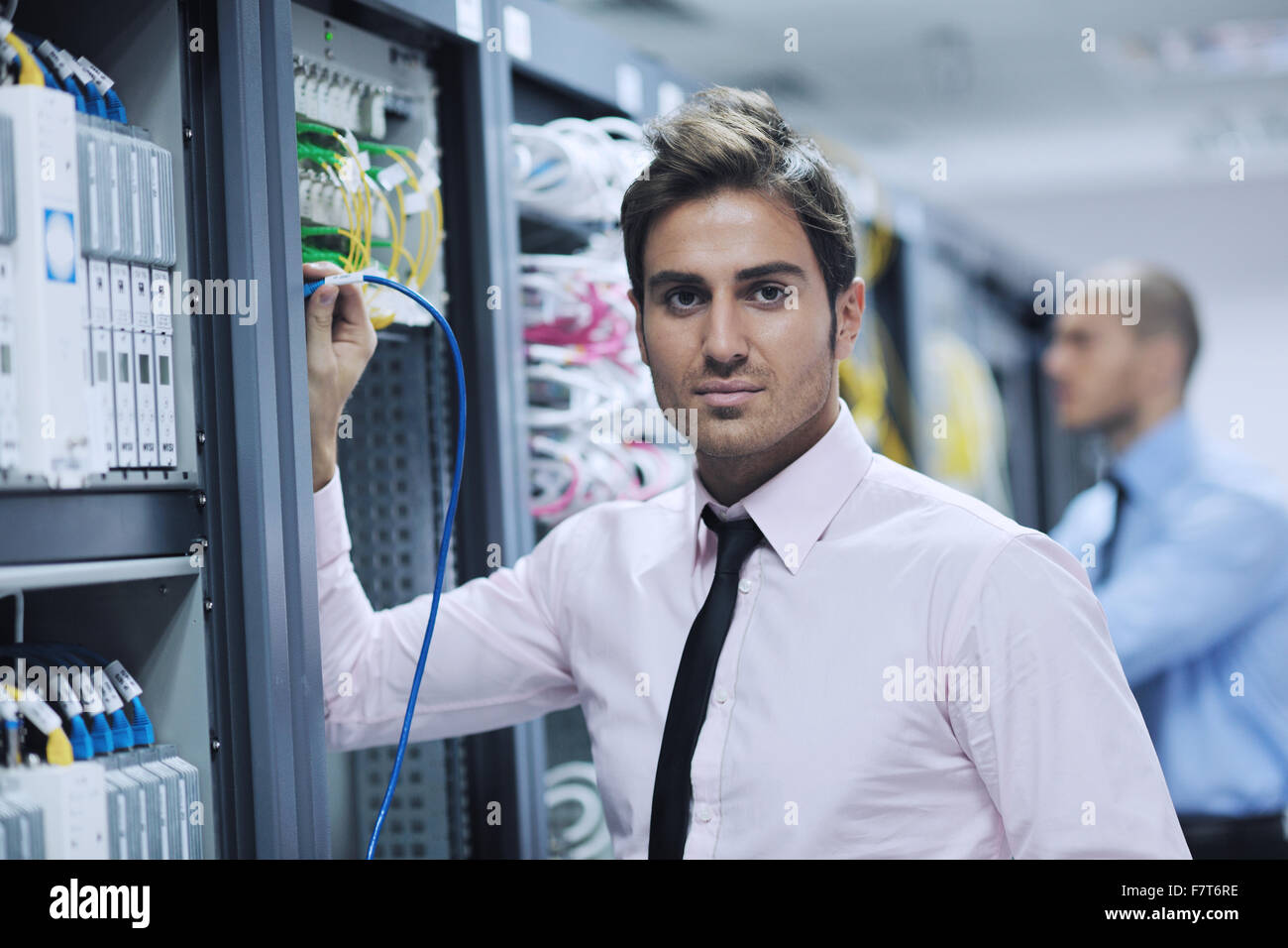 group of young business people it engineer in network server room ...
