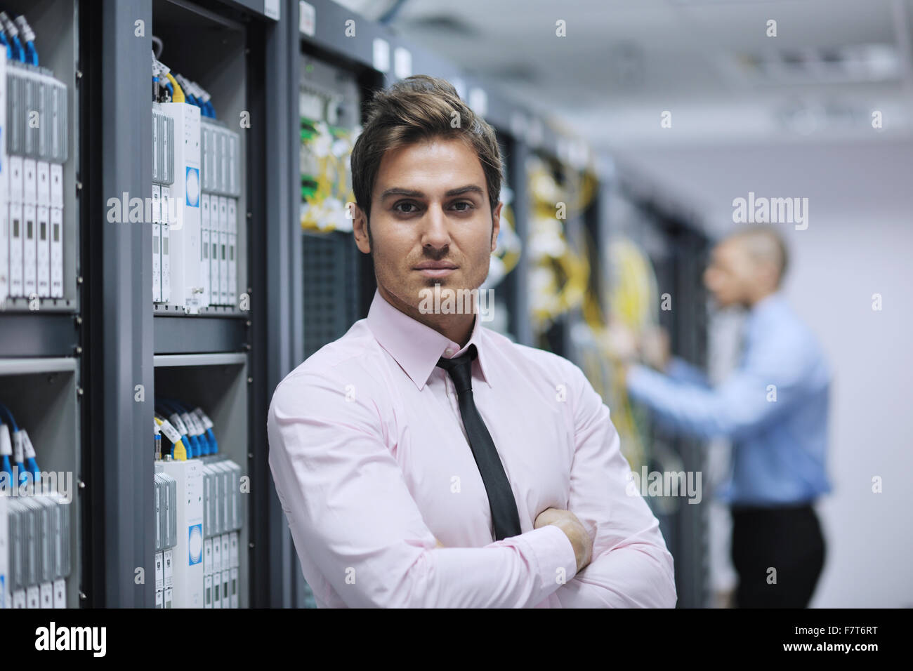 group of young business people it engineer in network server room ...