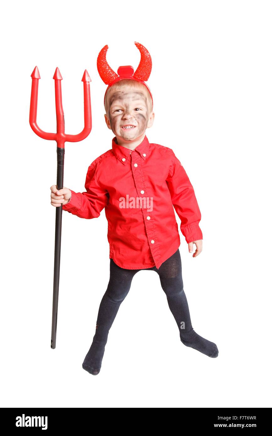 Little boy with trident in a devil costume (on white background Stock ...