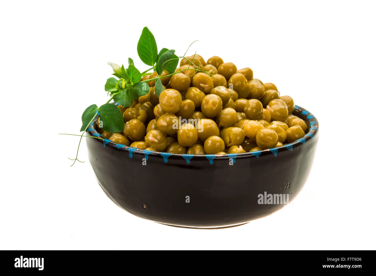 Marinated green peas with branch Stock Photo - Alamy