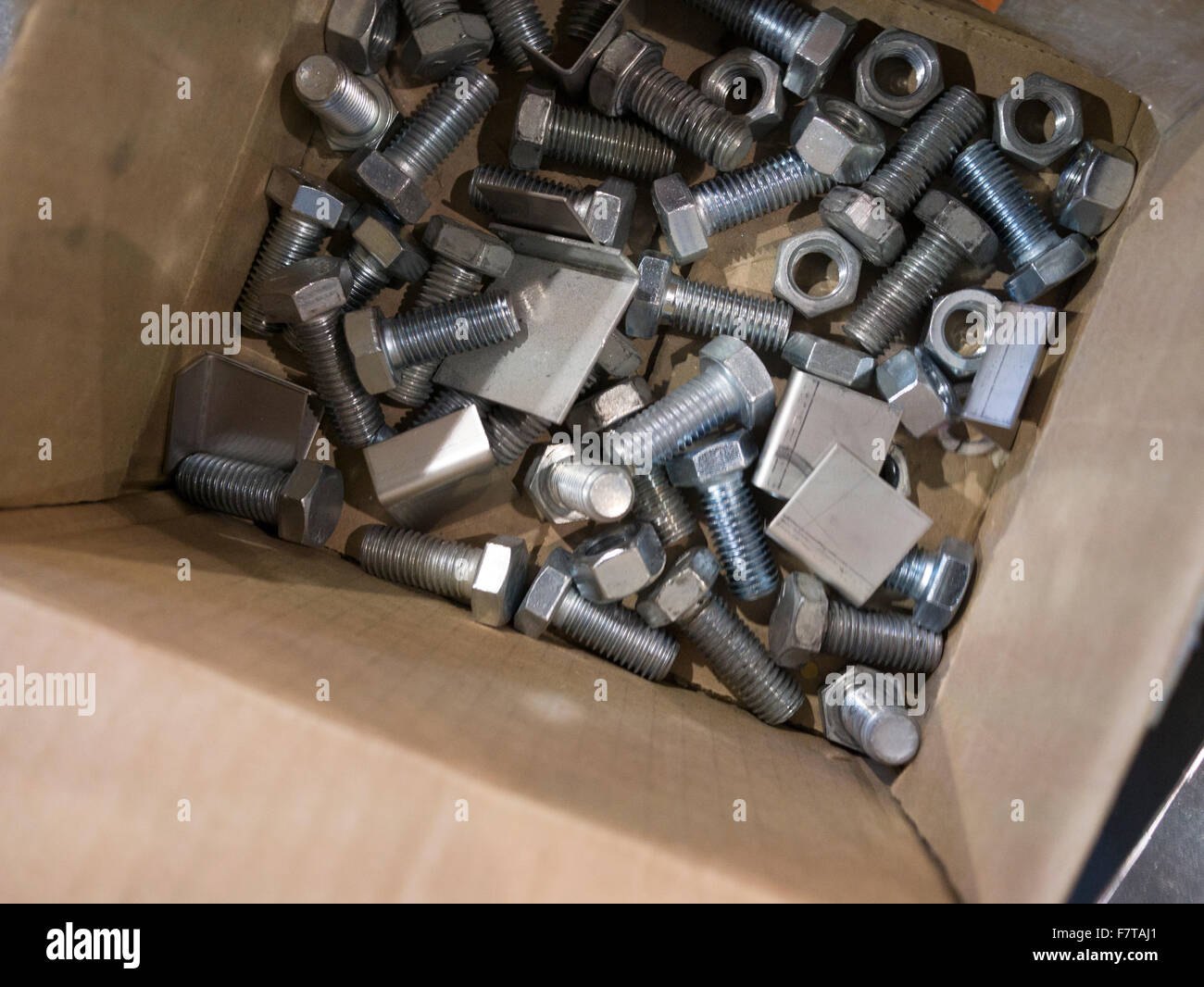 Nuts, Bolts, Fasteners in a box Stock Photo - Alamy