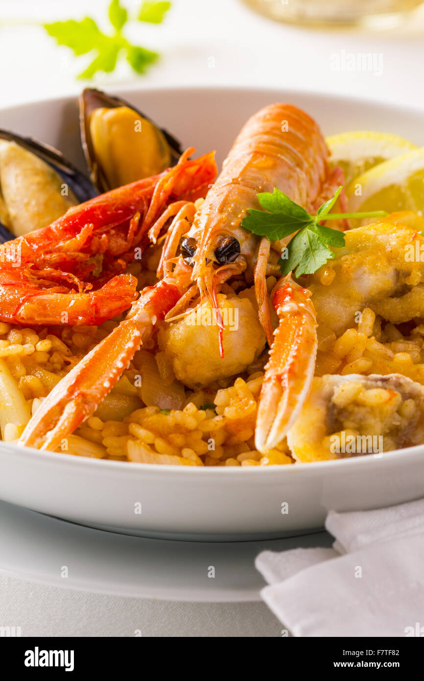Spanish rice and seafood dish called paella Stock Photo - Alamy