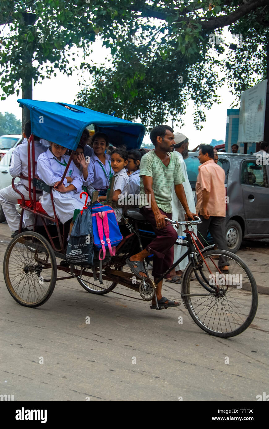 heavy load at rickshaw in new delhi india Stock Photo - Alamy