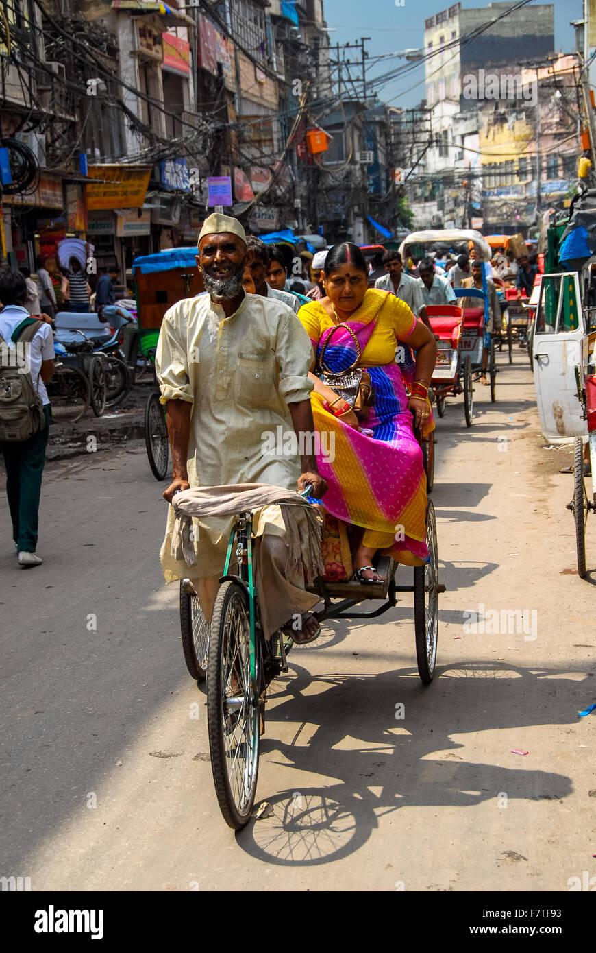 heavy load at rickshaw in new delhi india Stock Photo - Alamy