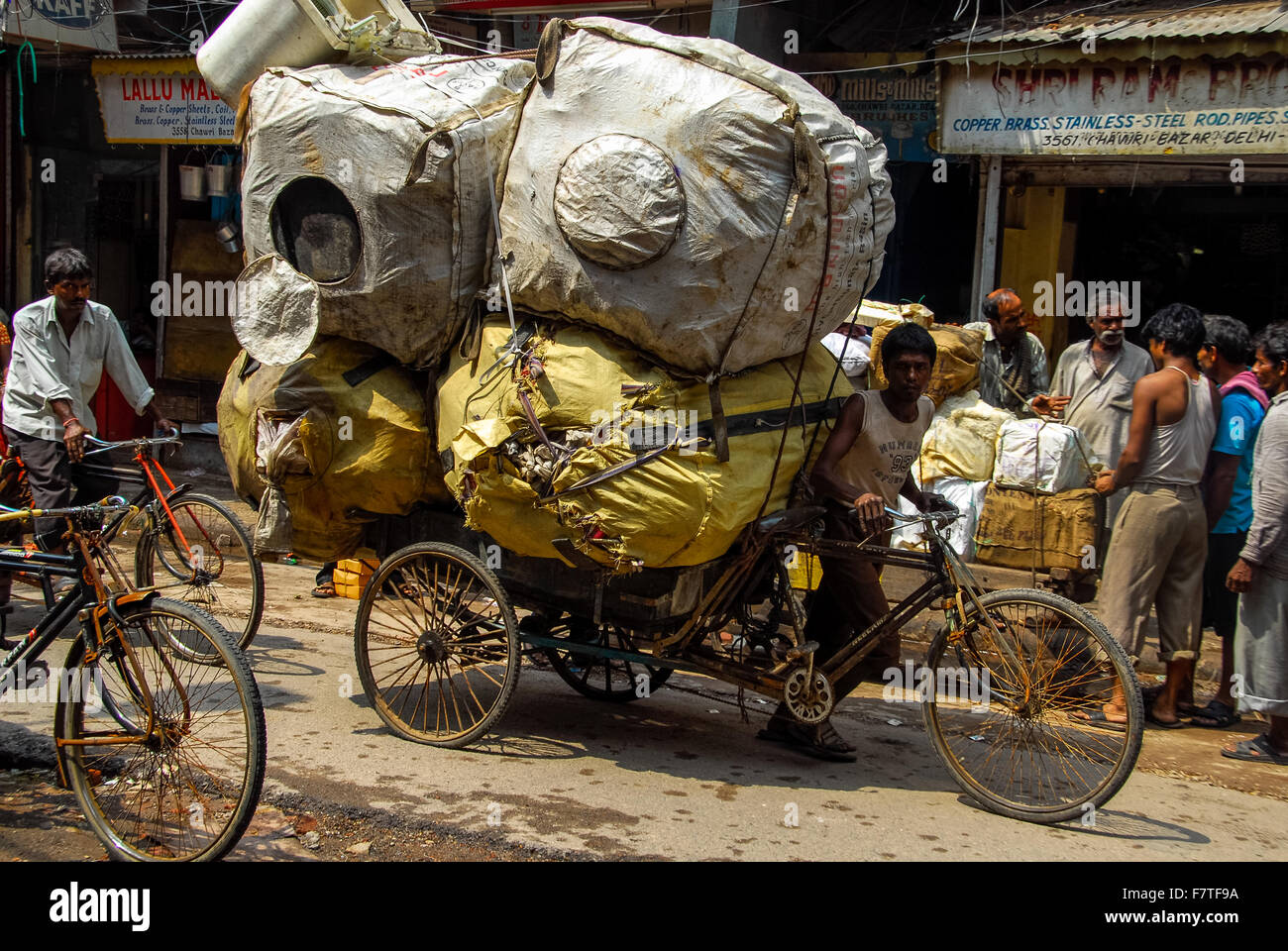 heavy load at rickshaw in new delhi india Stock Photo - Alamy