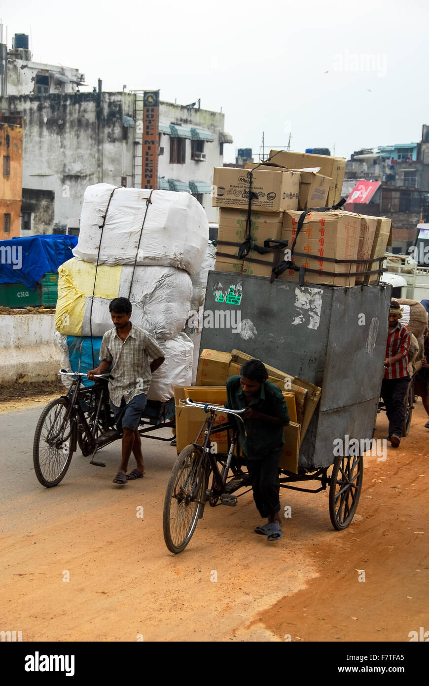 heavy load at rickshaw in new delhi india Stock Photo - Alamy